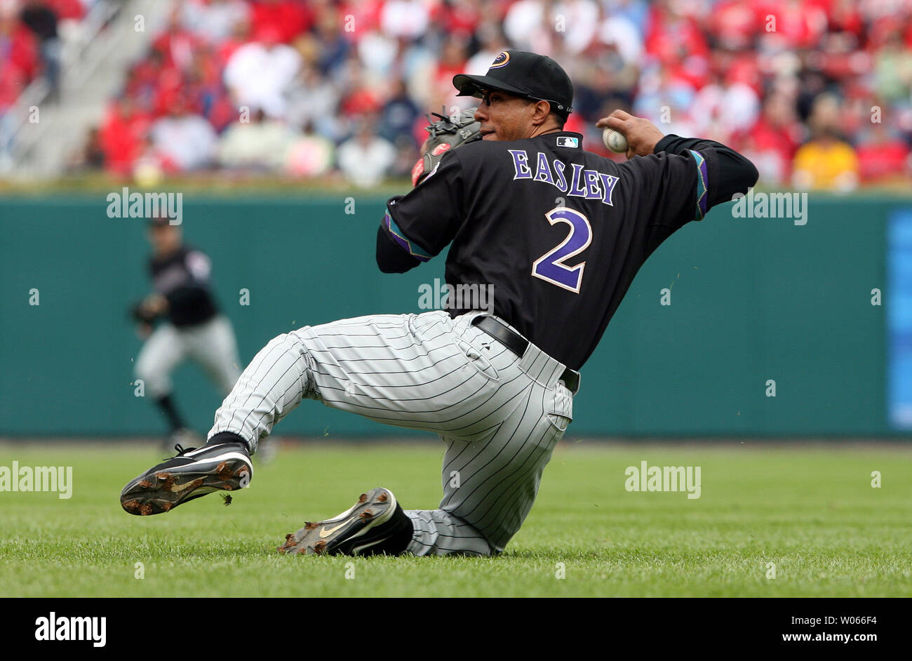 Arizona Diamondbacks Damion Easley makes a late throw to first base ...