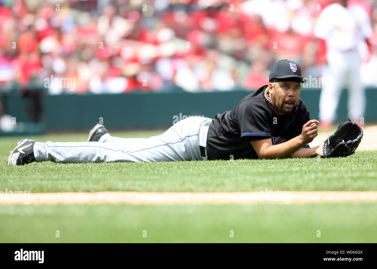 New York Mets pitcher Jose Lima watches the end of a play after he ...