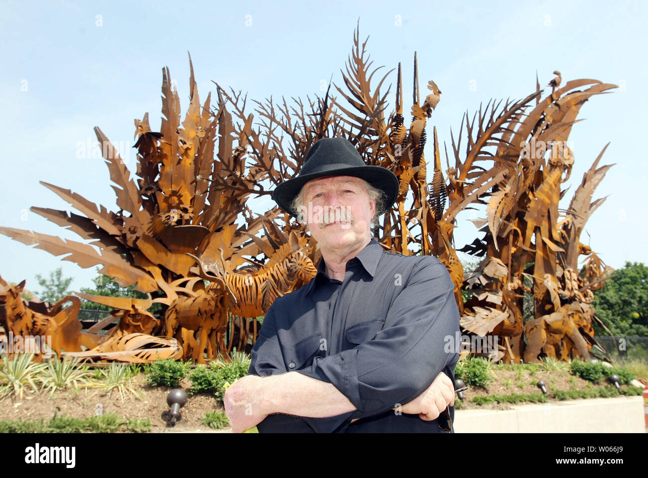 Sculptor Albert Paley from Rochester, NY, stands in front of his newest ...