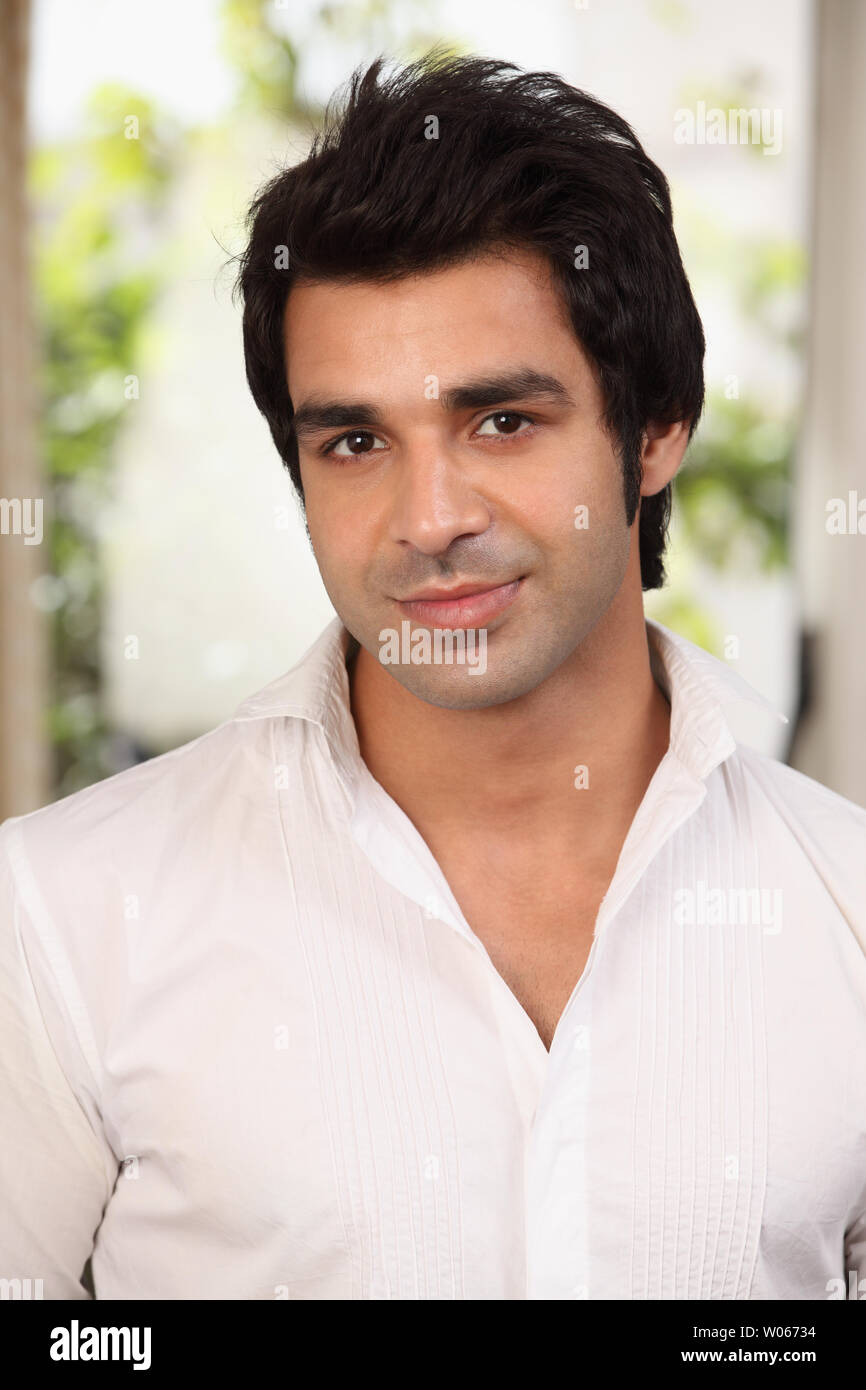 Portrait of an Indian young man Stock Photo - Alamy
