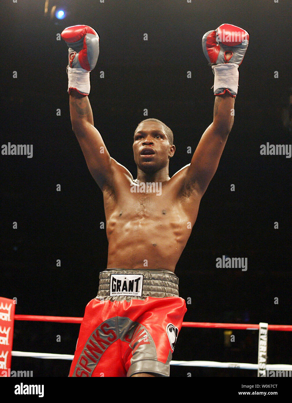 St. Louis native Cory Spinks raises his arms in victory as the final ...