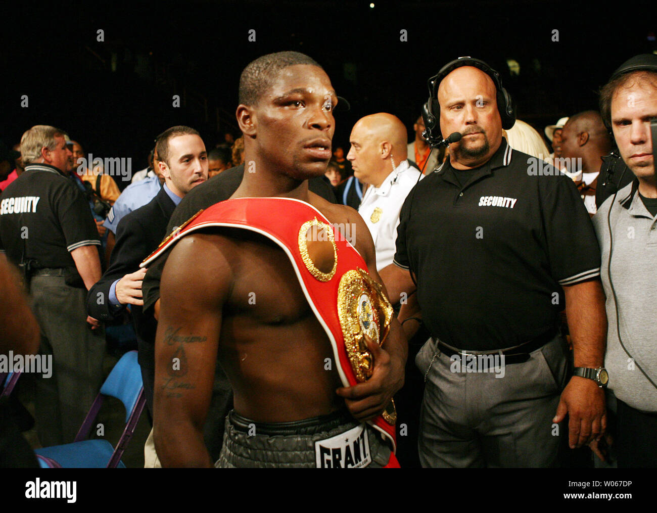 St. Louis native Cory Spinks leaves the ring area with his new belt ...