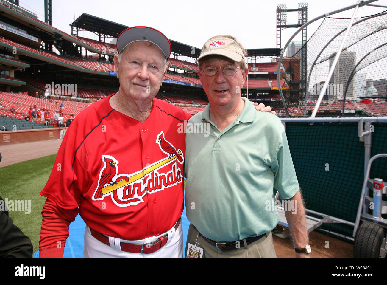 ABC News' George Will (R) poses for a photograph with former St. Louis ...