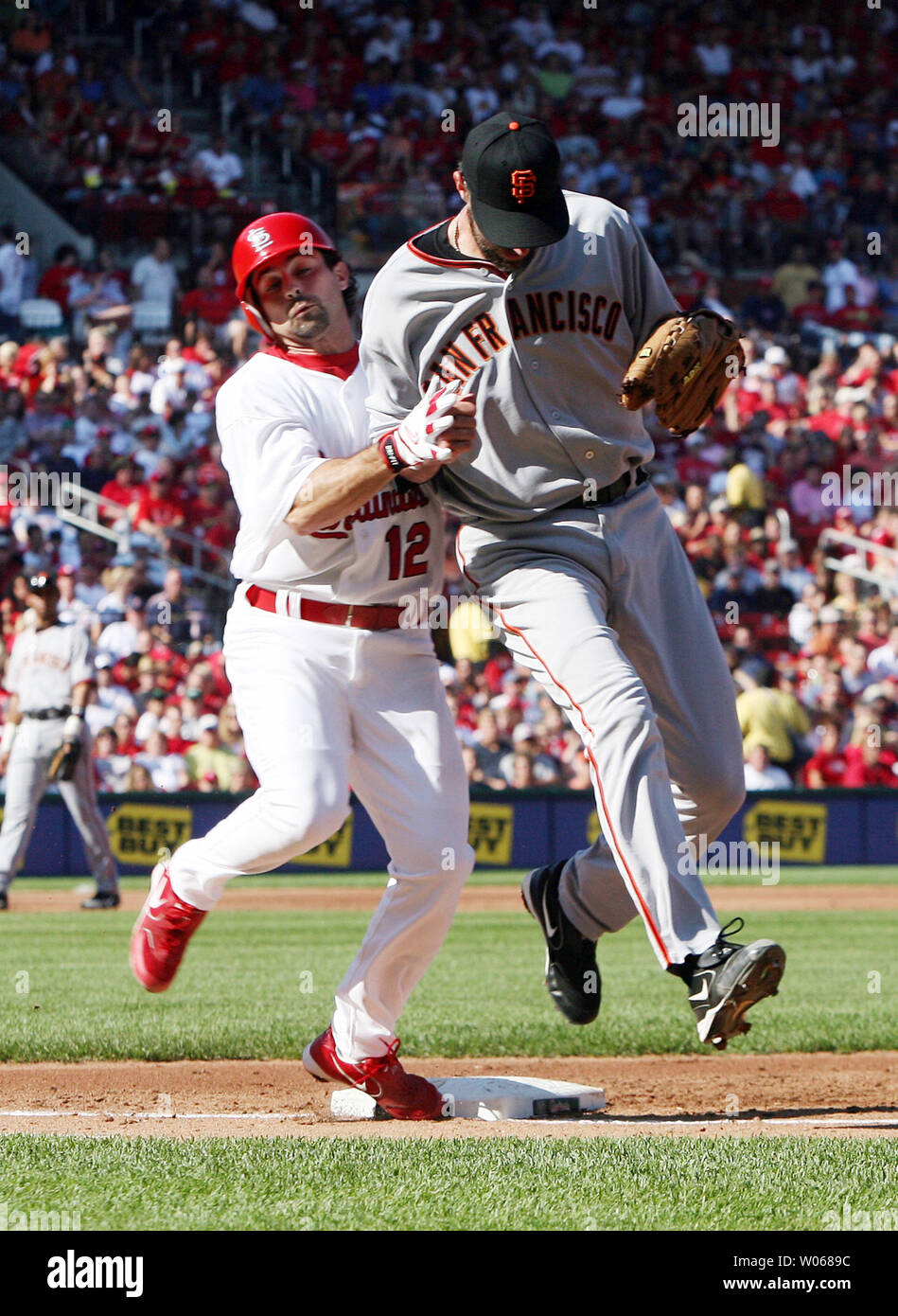 St. Louis Cardinals Aaron Miles collides with San Francisco Giants ...