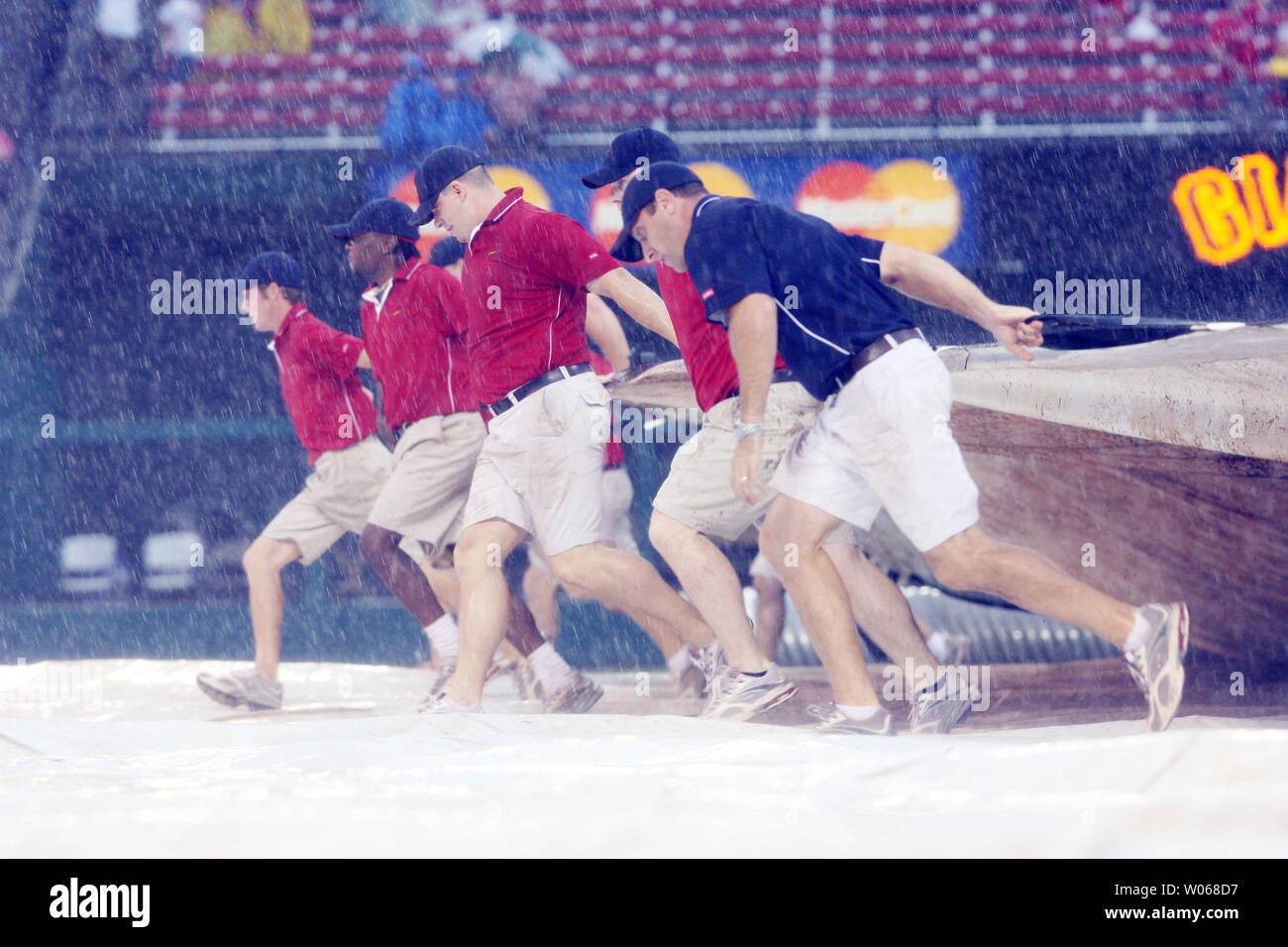 Rain tarp crew hi-res stock photography and images - Alamy