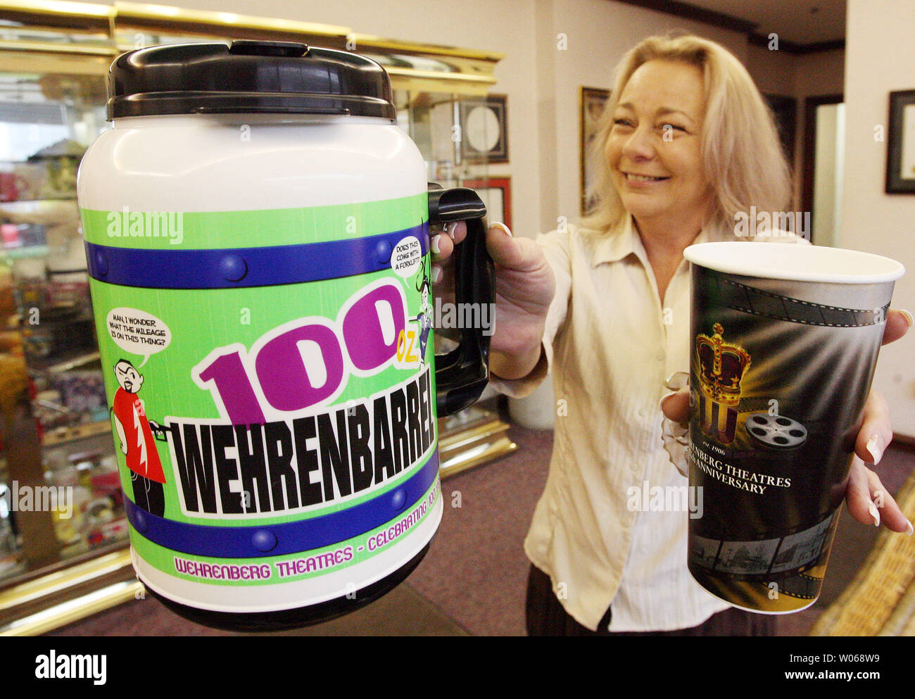 Kelly Hoskins with Wehrenberg Theaters displays a traditional 16 ounce ...