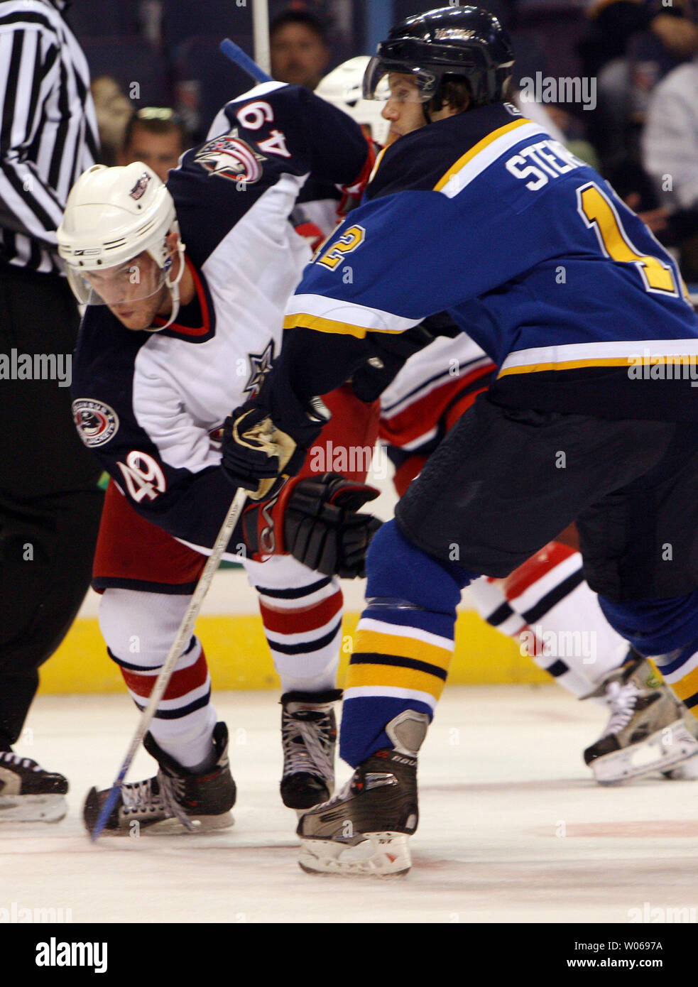 St. Louis Blues Lee Stempniak (12) ties up Columbus Blue Jackets Dan ...
