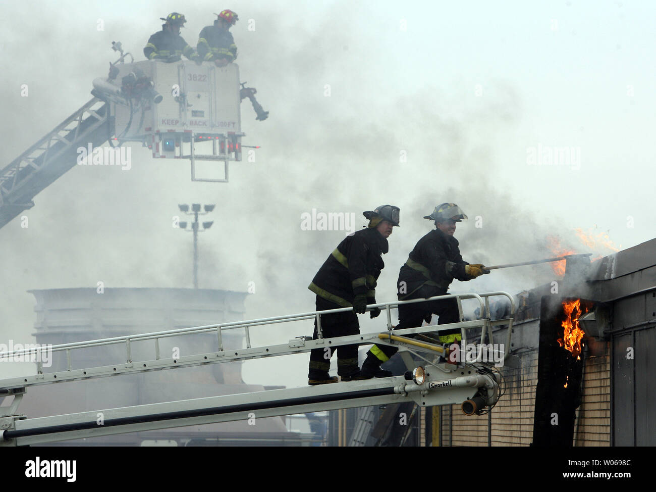 St. Louis firefighters Mike Heep (R) and Bob Barton of Rescue Squad 2 ...