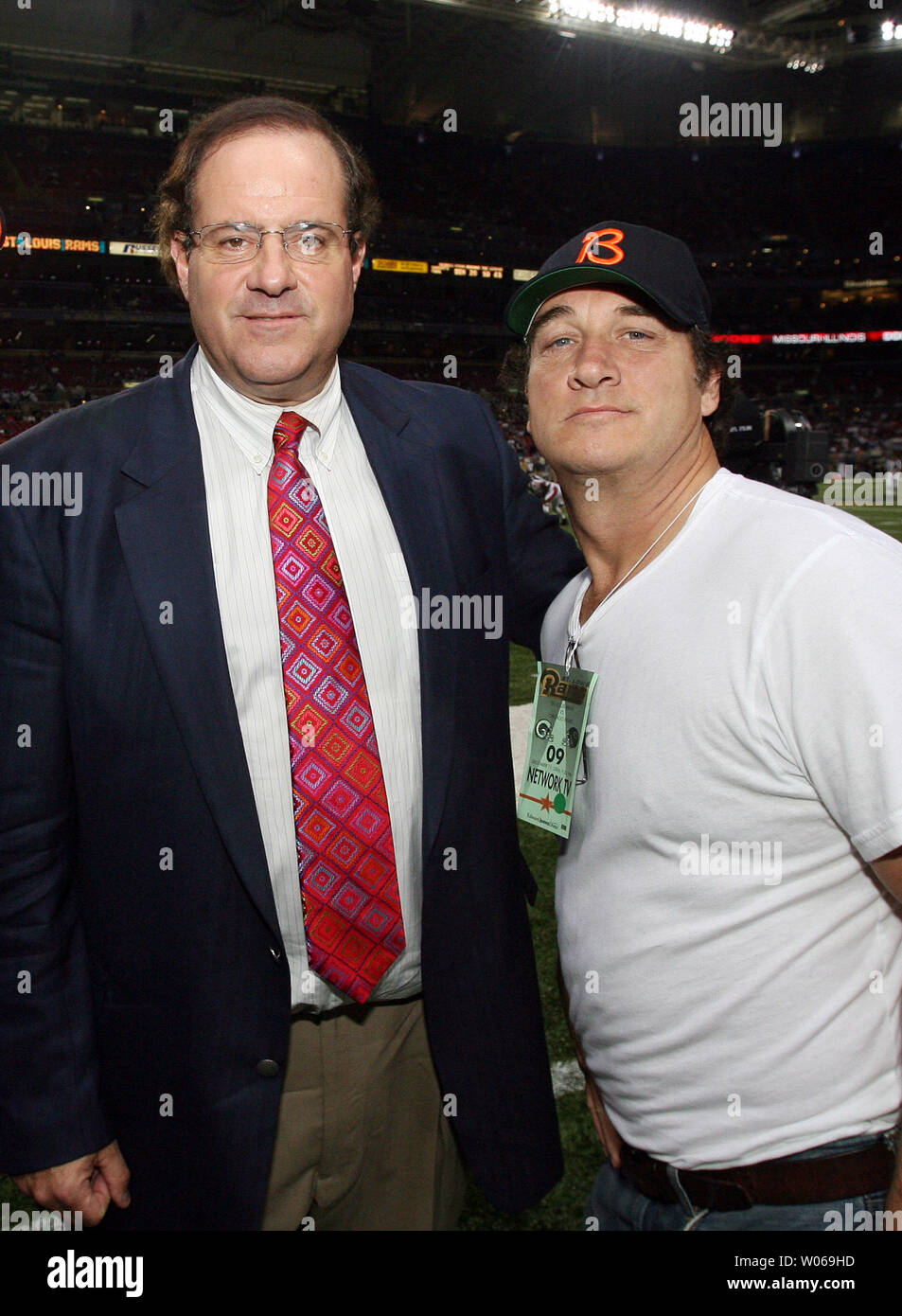 ESPN's Chris Berman (L) and actor Jim Belushi pose for a photograph on ...