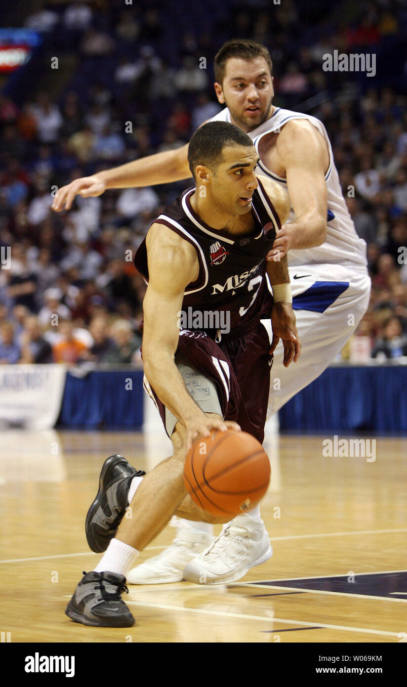 Missouri State University Bears Tyler Chaney (L) drives past Saint ...