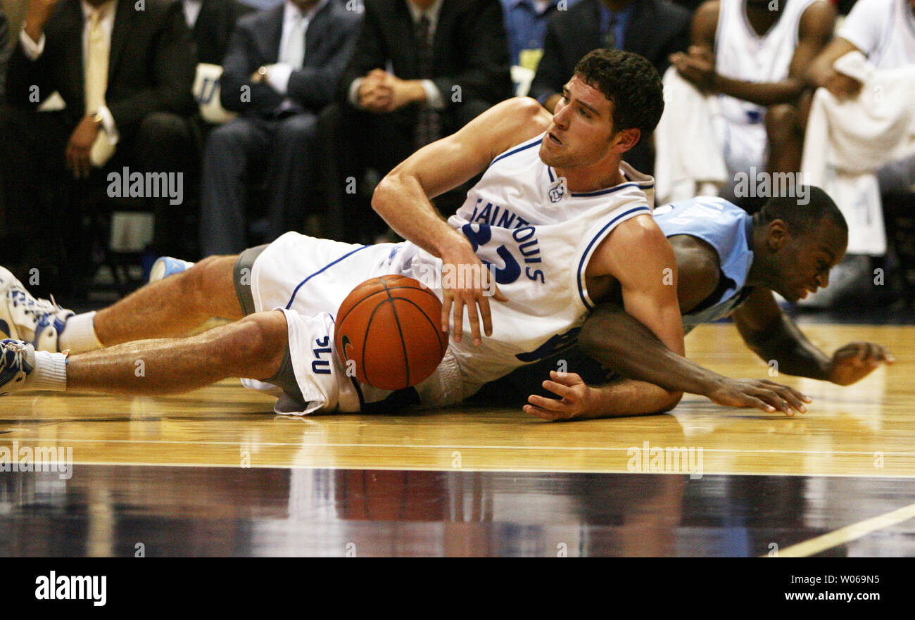 University of North Carolina's Marcus Ginyard (R) and Saint Louis ...
