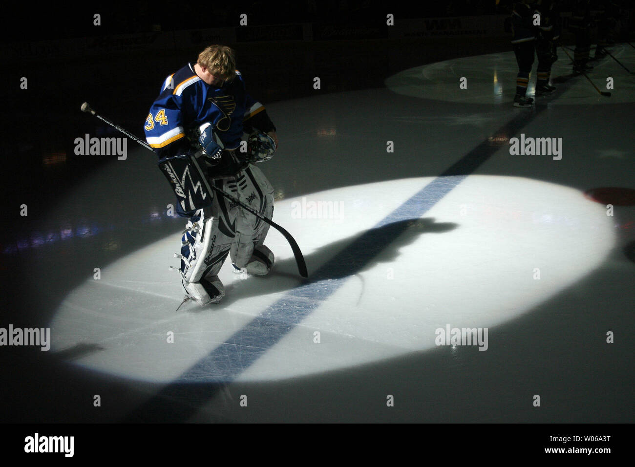 St. Louis Blues goaltender Manny Legace stands for the National Anthem ...