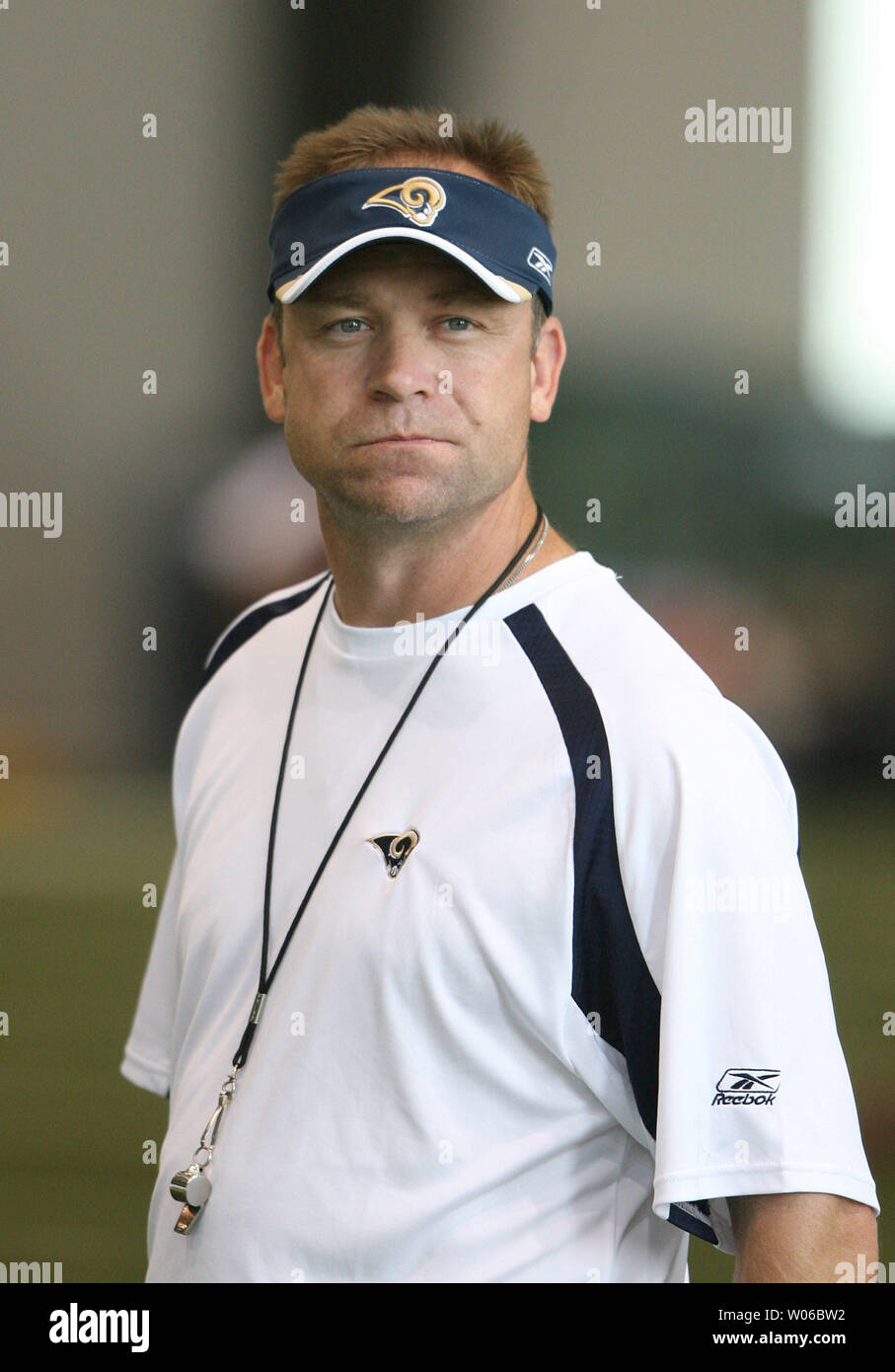 St. Louis Rams head football coach Scott Linehan looks over his team ...