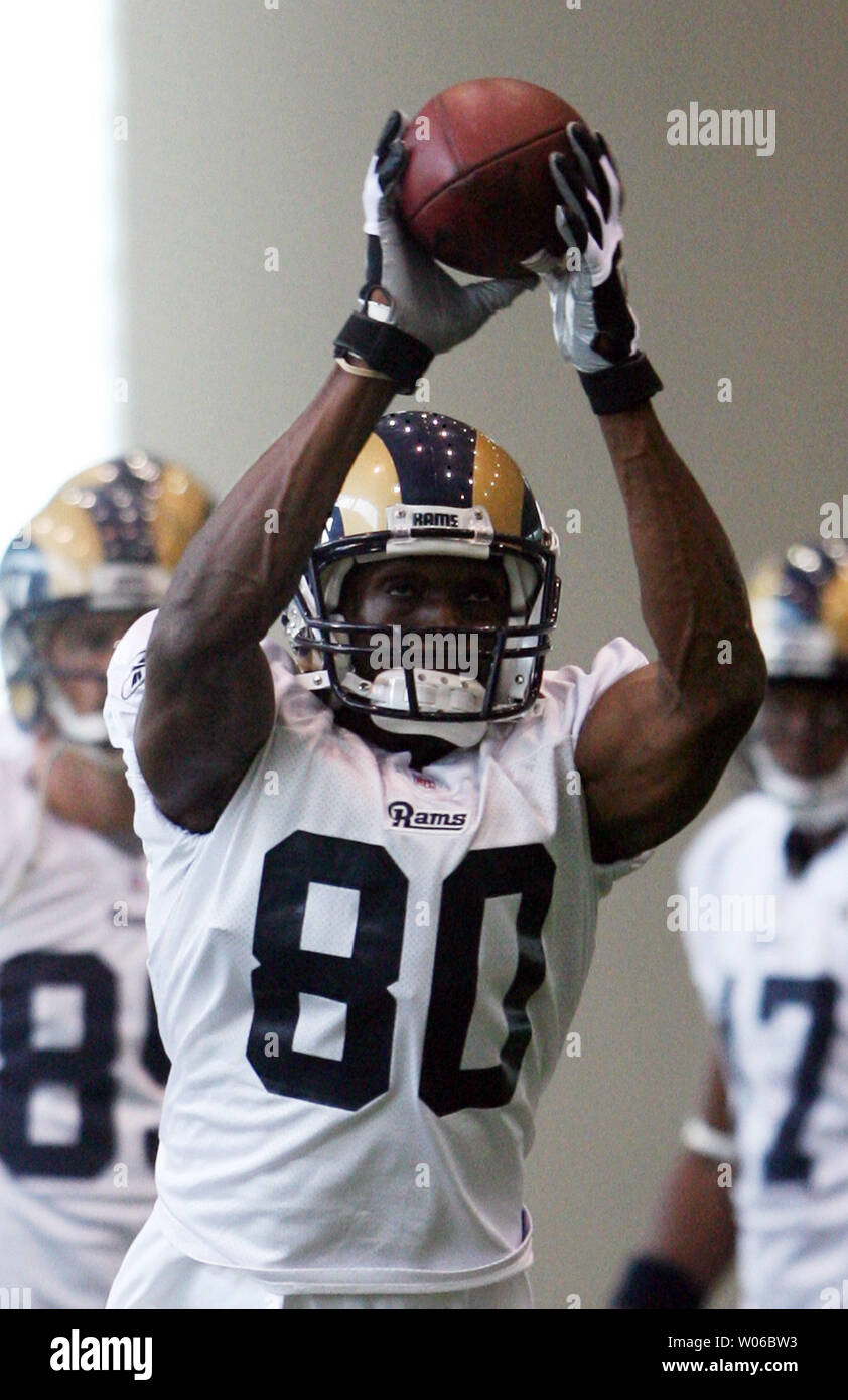 St. Louis Rams Isaac Bruce makes a catch during an afternoon session of ...