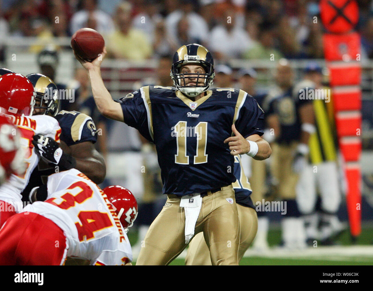 St. Louis Rams quarterback Ryan Fitzpatrick throws a pass under ...