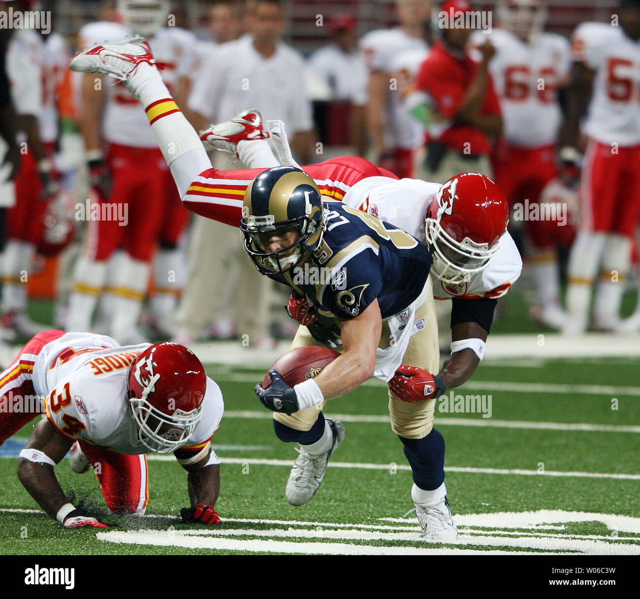 Kansas City Chiefs Benny Sapp flys across the back of St. Louis Rams ...
