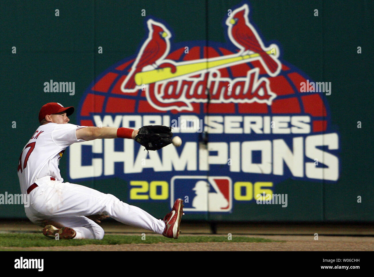 St. Louis Cardinals rightfielder Ryan Ludwick makes a sliding attempt ...