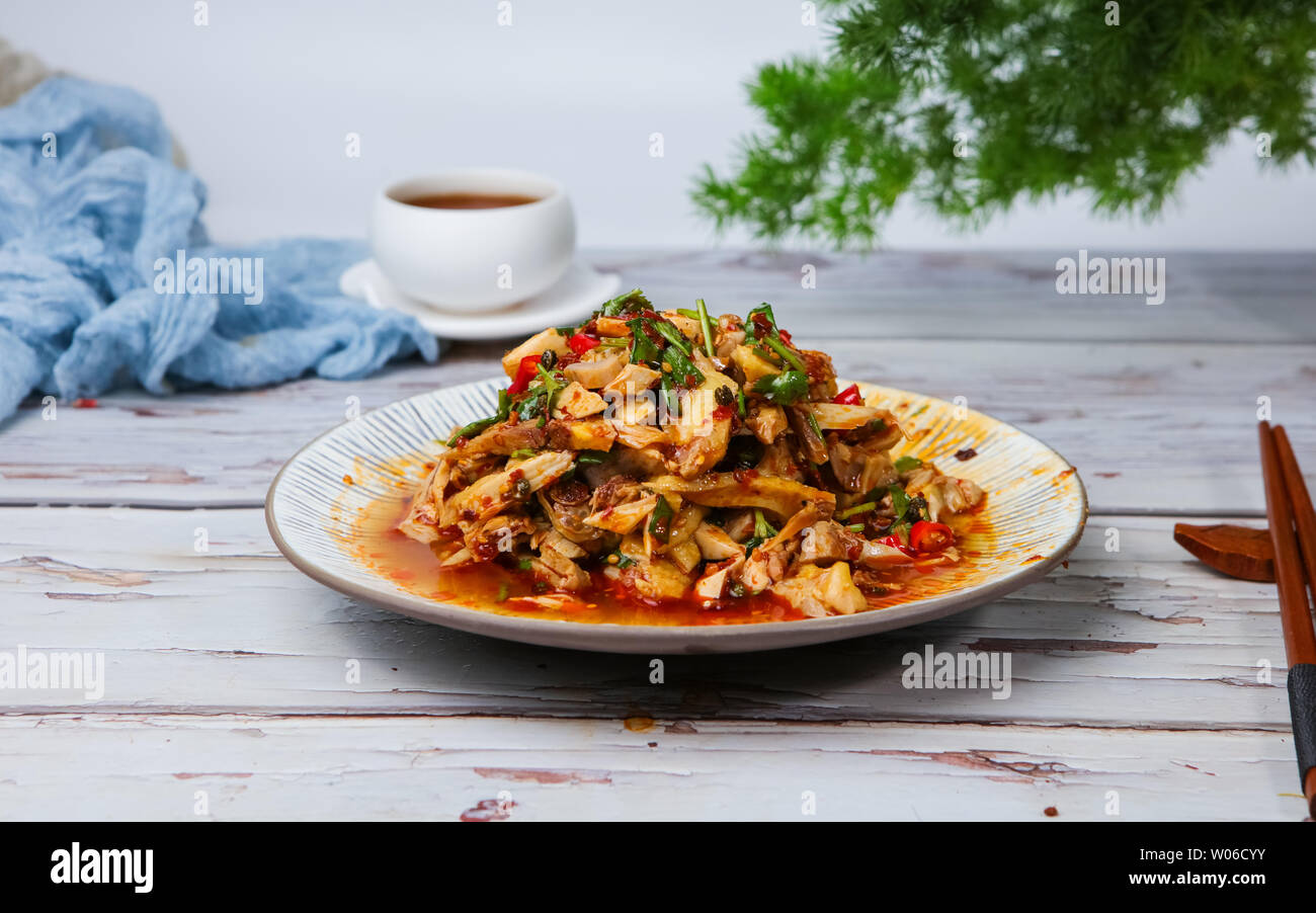 drooling chicken, stick chicken Stock Photo - Alamy