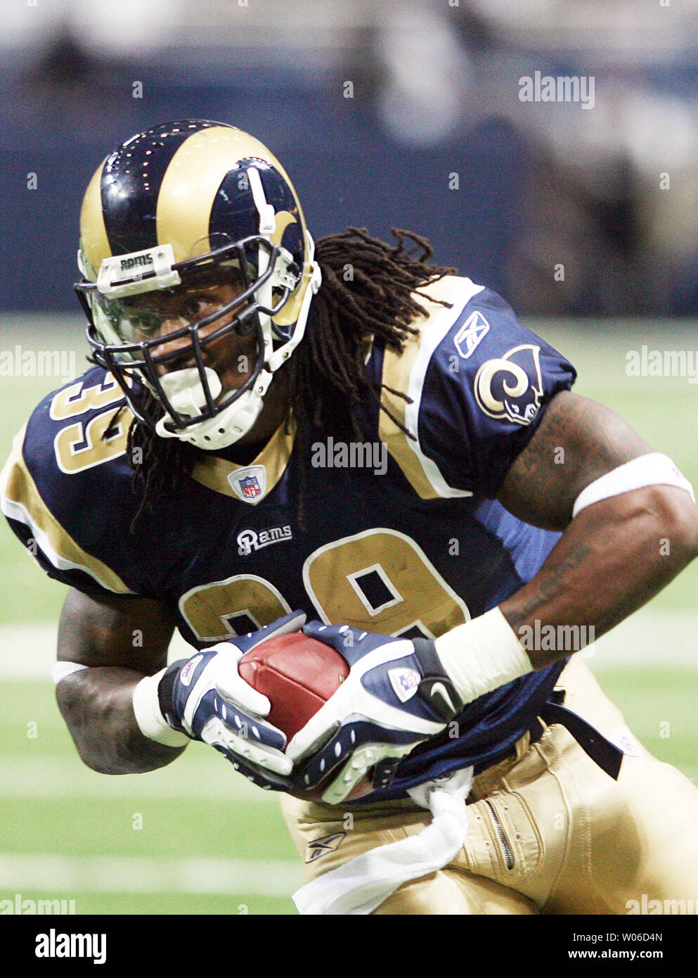 St. Louis Rams Steven Jackson picks up an eight-yard gain in the second ...