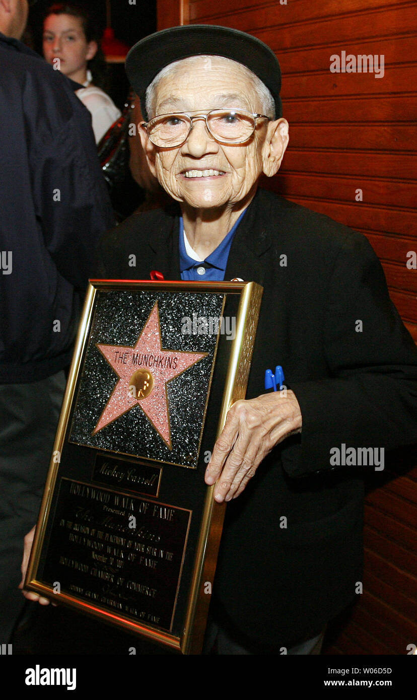 Original "Wizard of Oz," munchkin Mickey Carroll displays his replica ...