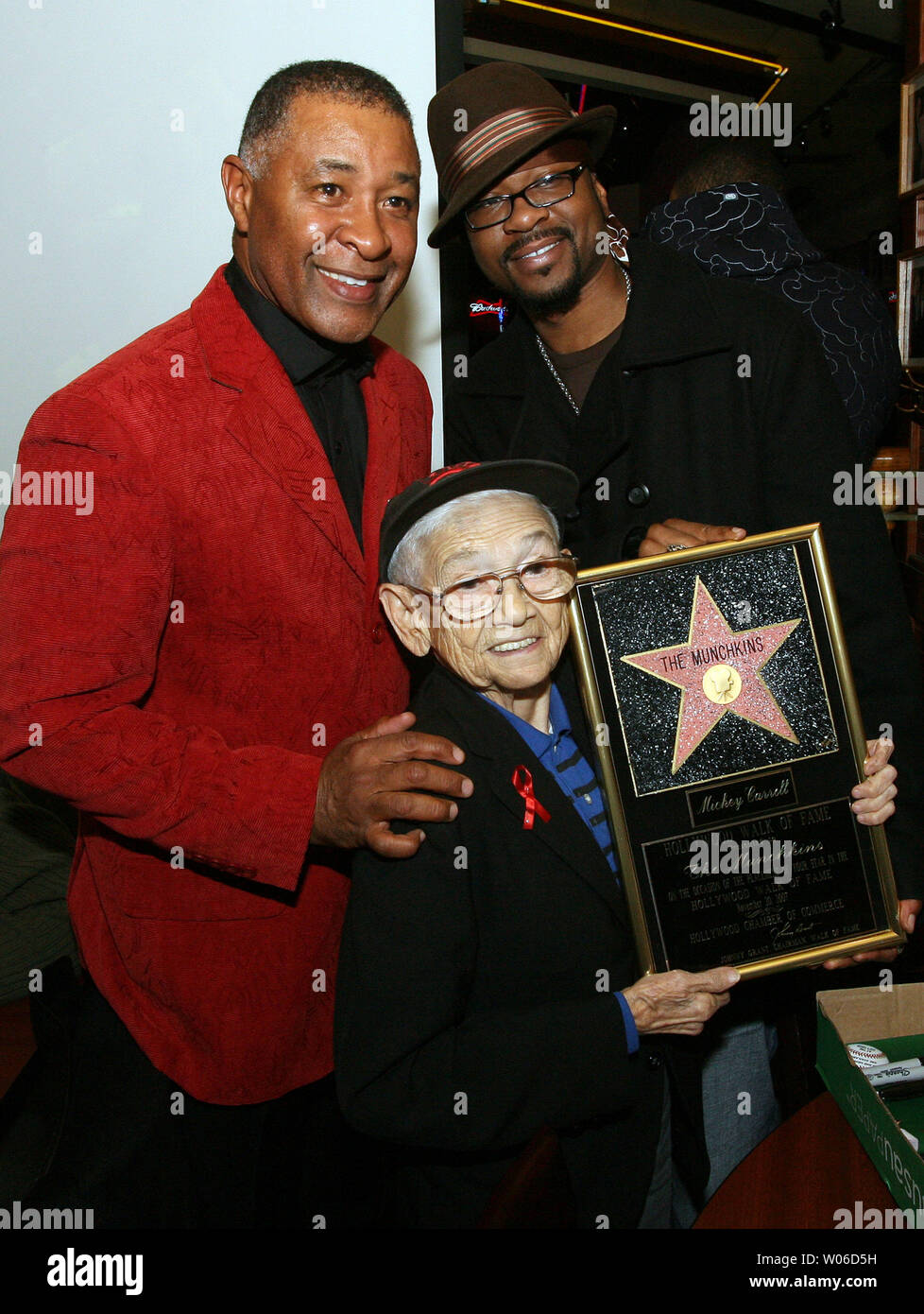 Original "Wizard of Oz," munchkin Mickey Carroll (C) displays his ...