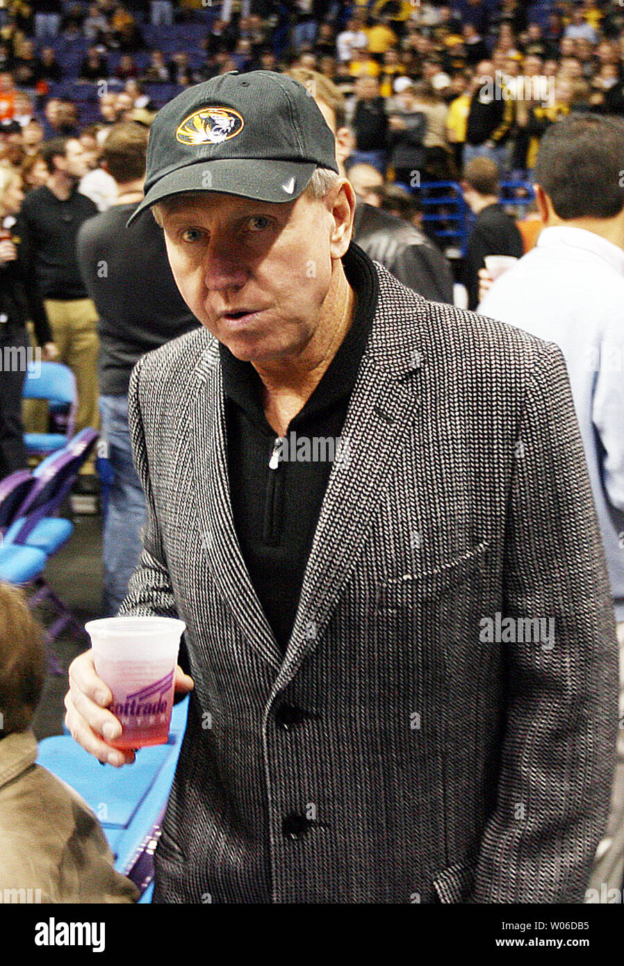 Former St. Louis Blues owner Bill Laurie makes his way to his seat ...