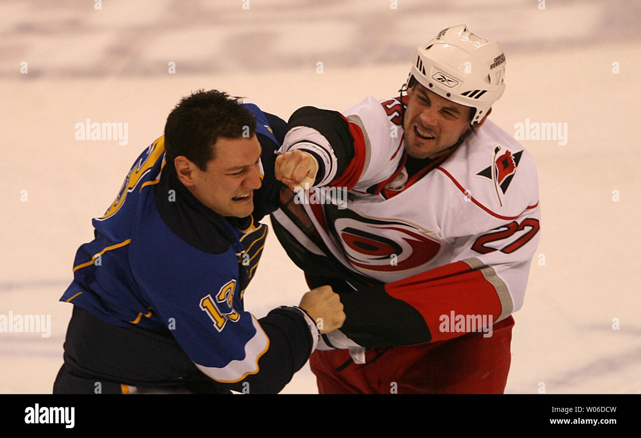 Carolina Hurricanes' Craig Adams (R) connects a punch to the face of St ...