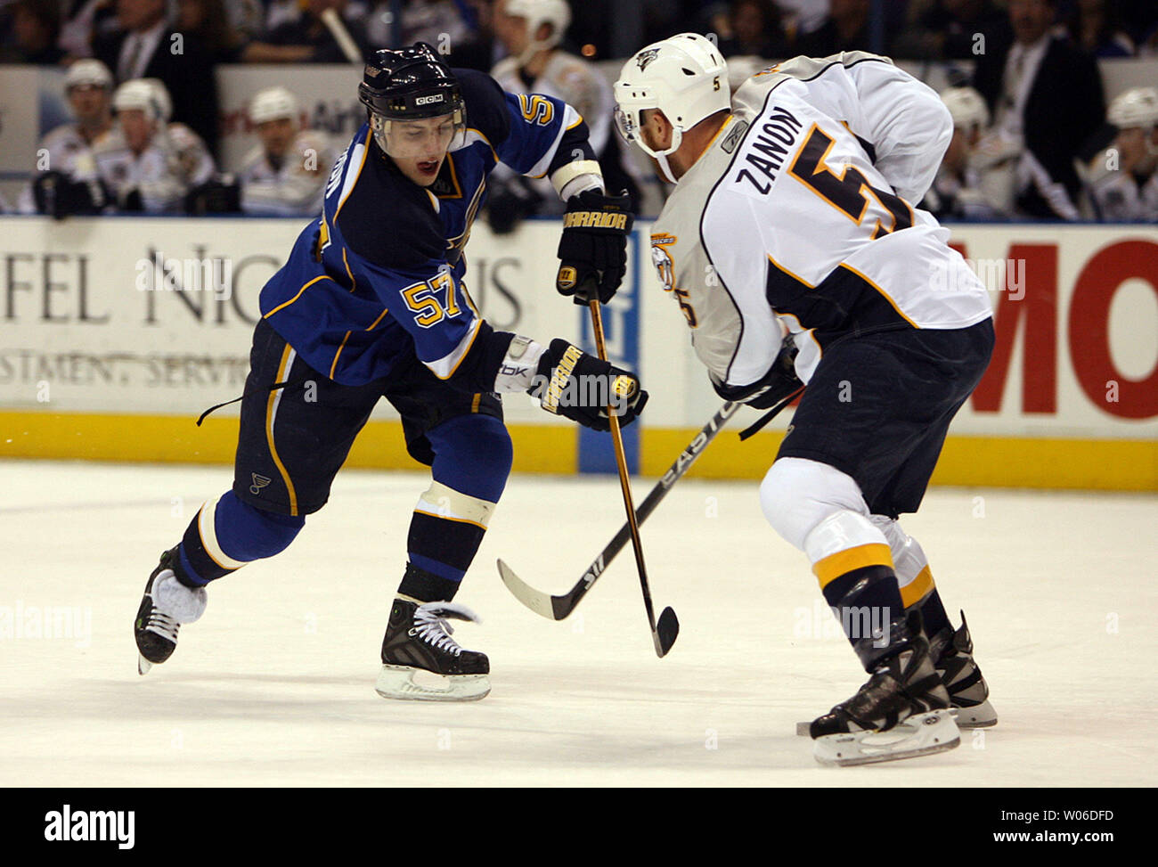 St. Louis Blues David Perron (L) tries to shoot the puck past Nashville ...