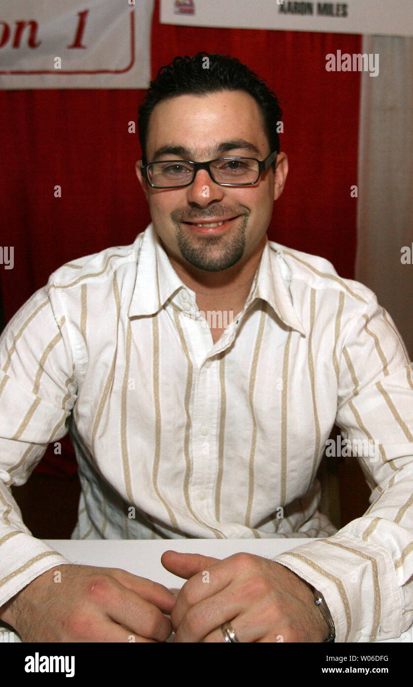 St. Louis Cardinals infielder Aaron Miles smiles for a photograph ...