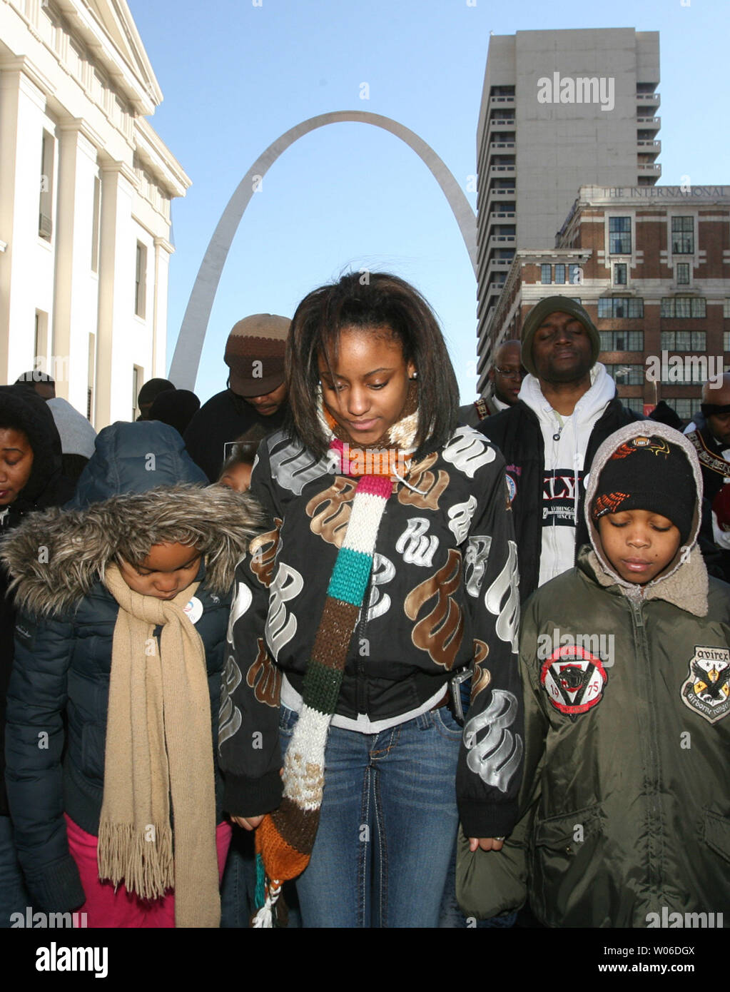 Marchers pause for a prayer before the start of the Annual Martin ...