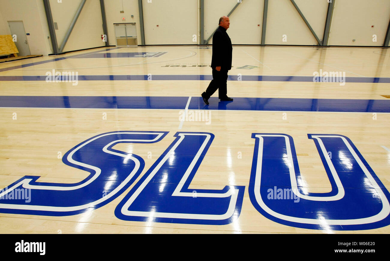 Father Lawrence Biondi S.J., President of Saint Louis University, walks ...
