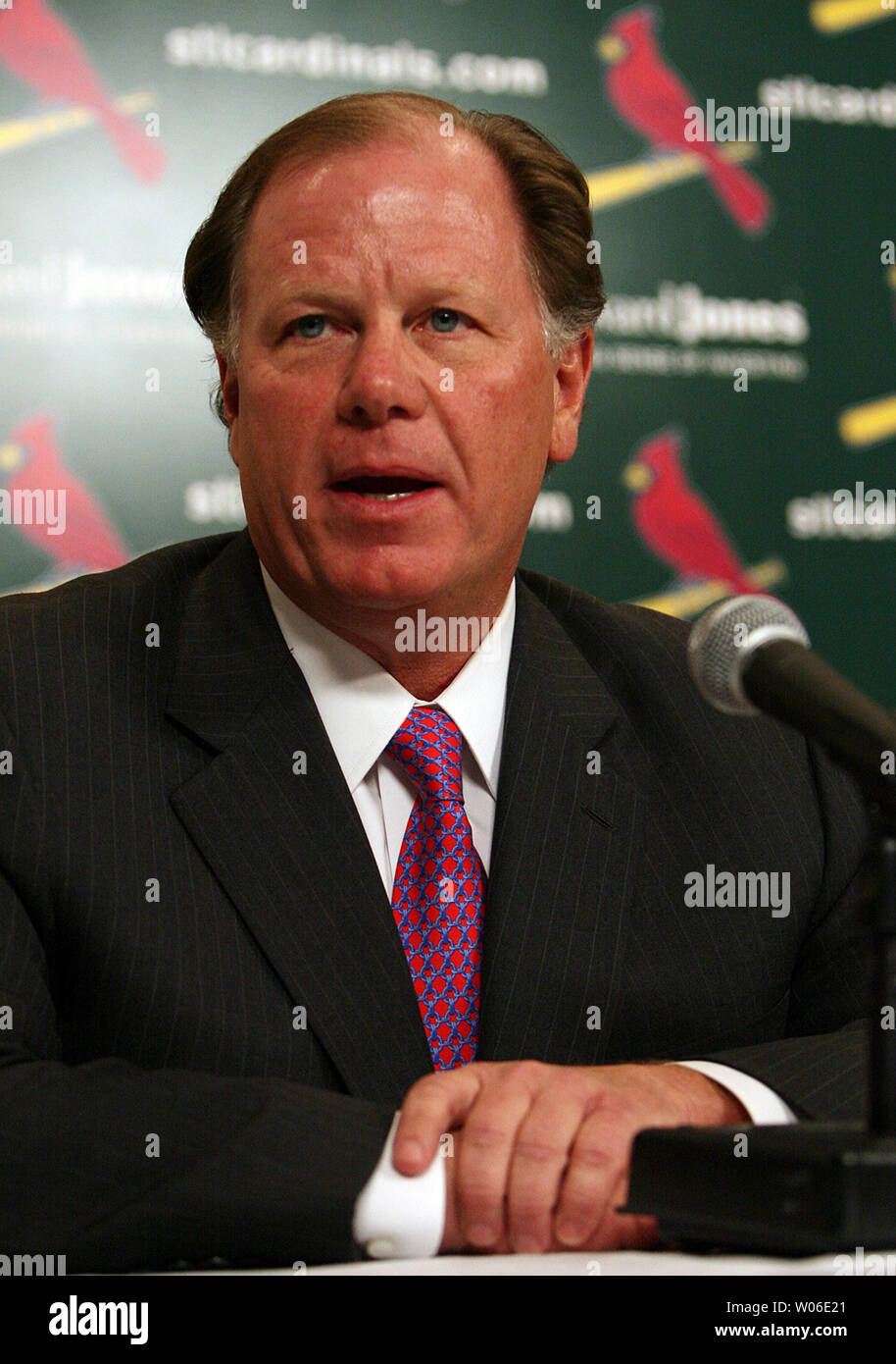 St. Louis Cardinals President Mark Lamping reads a statement to ...