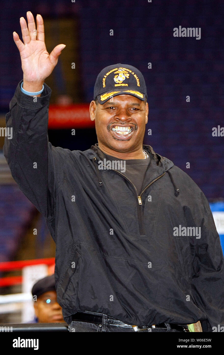 Former world championship boxer Leon Spinks waves to the crowd during ...