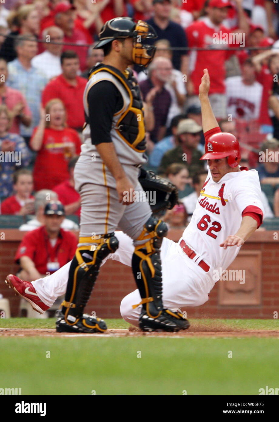 St. Louis Cardinals Joe Mather (62) slides safely past Pittsburgh ...