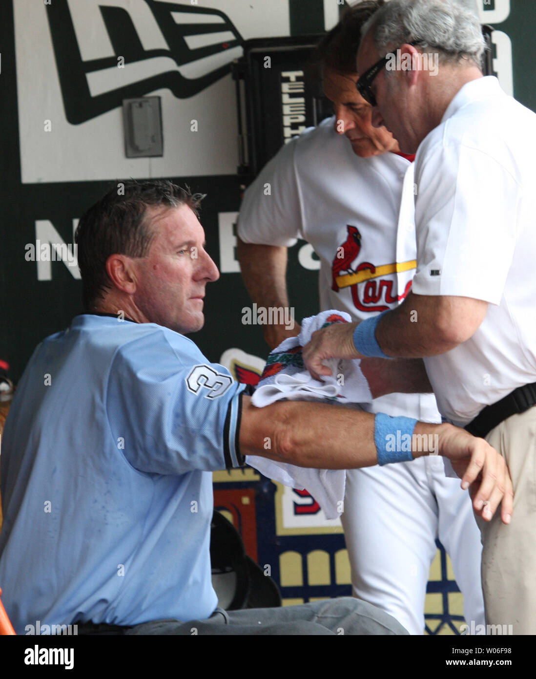 Homeplate umpire Tim McClelland gets a cool towel from St. Louis ...