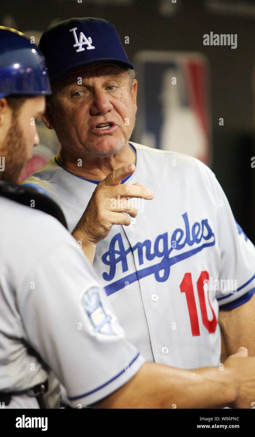 Los Angeles Dodgers third base coach Larry Bowa gives advise to catcher ...
