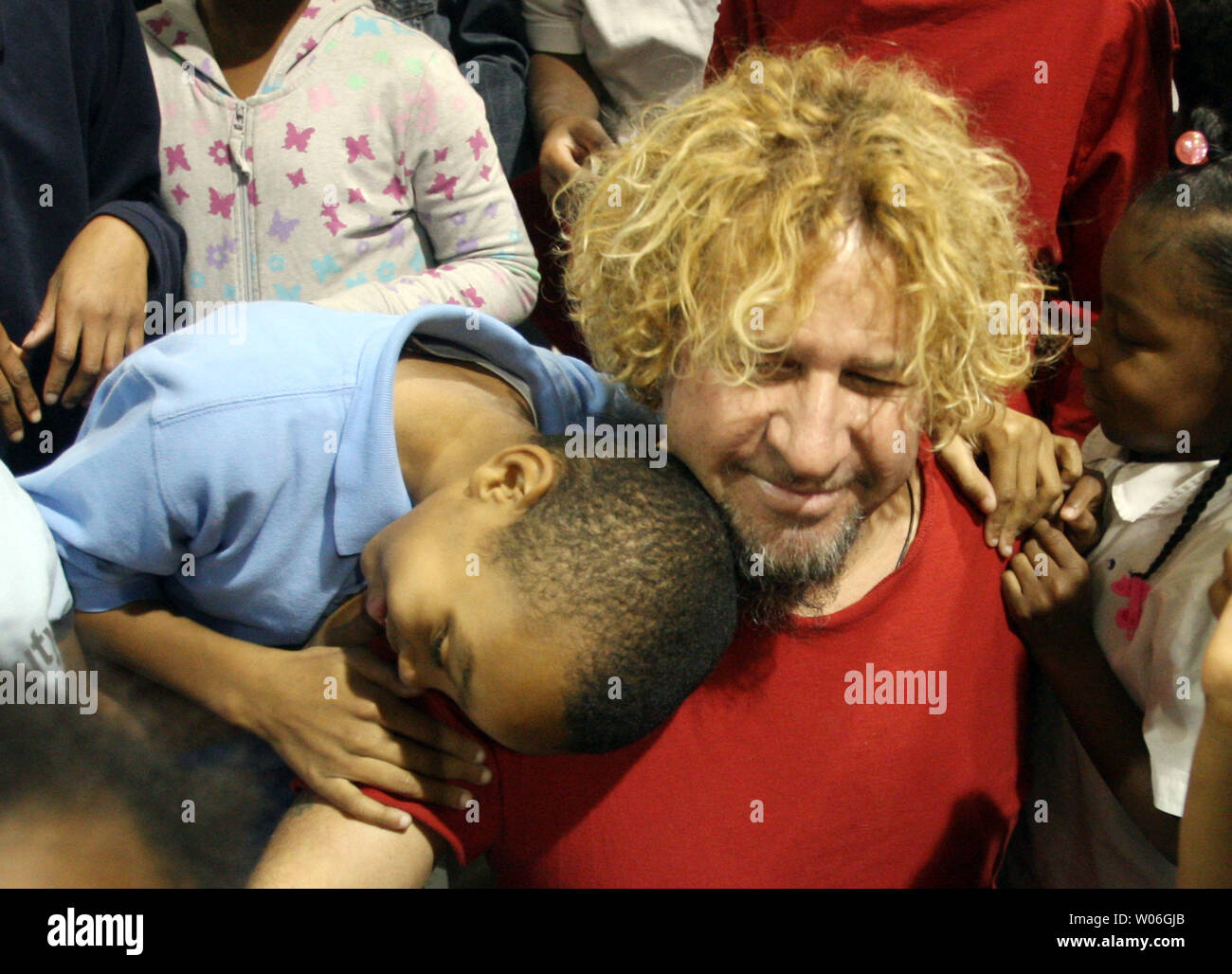 Rock and Roll Hall of Famer Sammy Hagar gets a hug from Najee Boston (6 ...