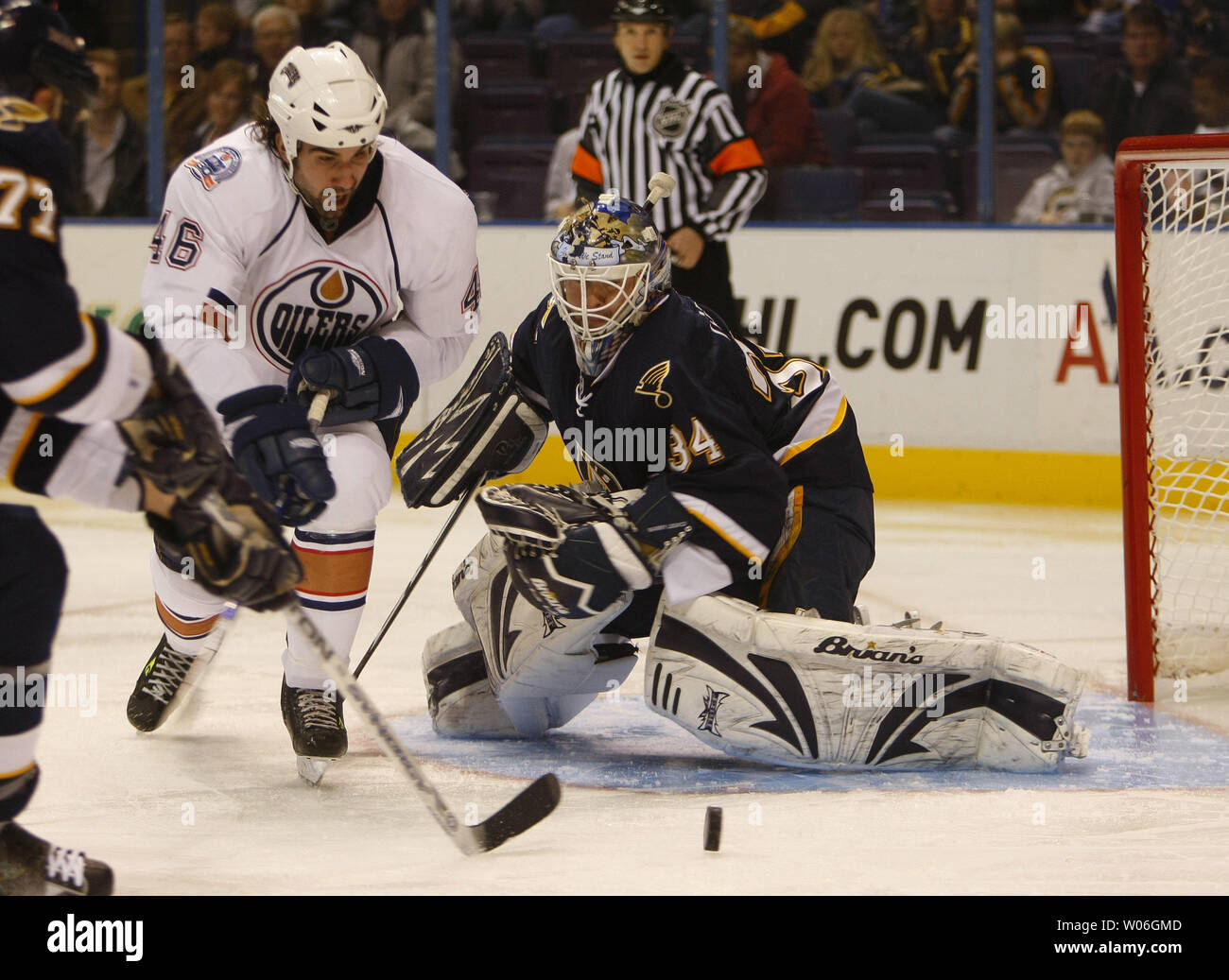 Edmonton Oilers Zack Stortini (46) chases down the loose puck after ...