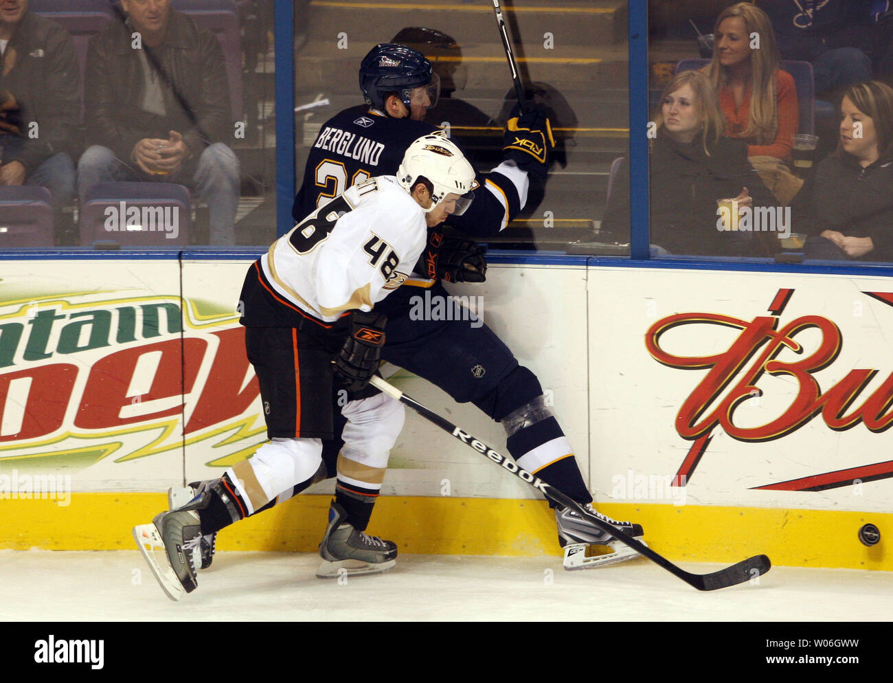 Anaheim Ducks Andrew Ebbett (48) puts St. Louis Blues Patrik Berglund ...