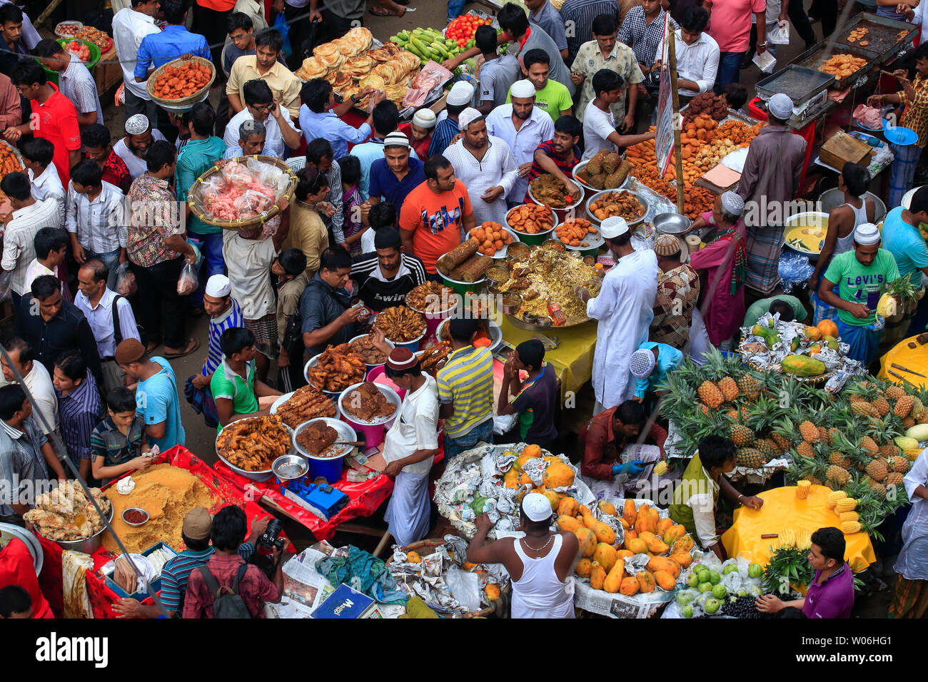 Chawk Bazar iftar market of Dhaka is well known for traditional spicy foods. Thousands of people ...