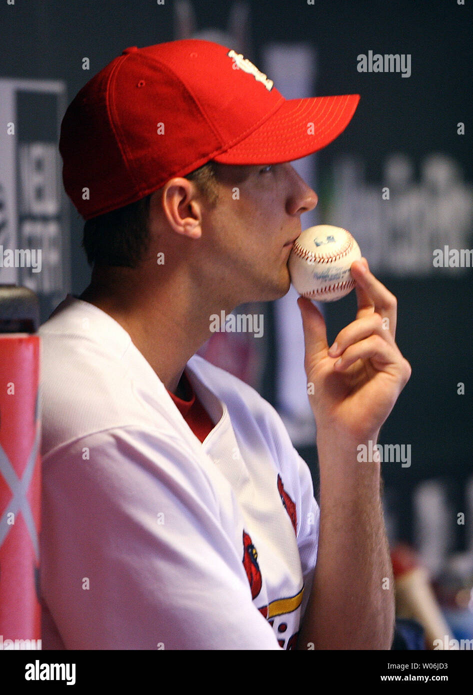 St. Louis Cardinals pitcher Adam Wainwright holds a baseball as he ...