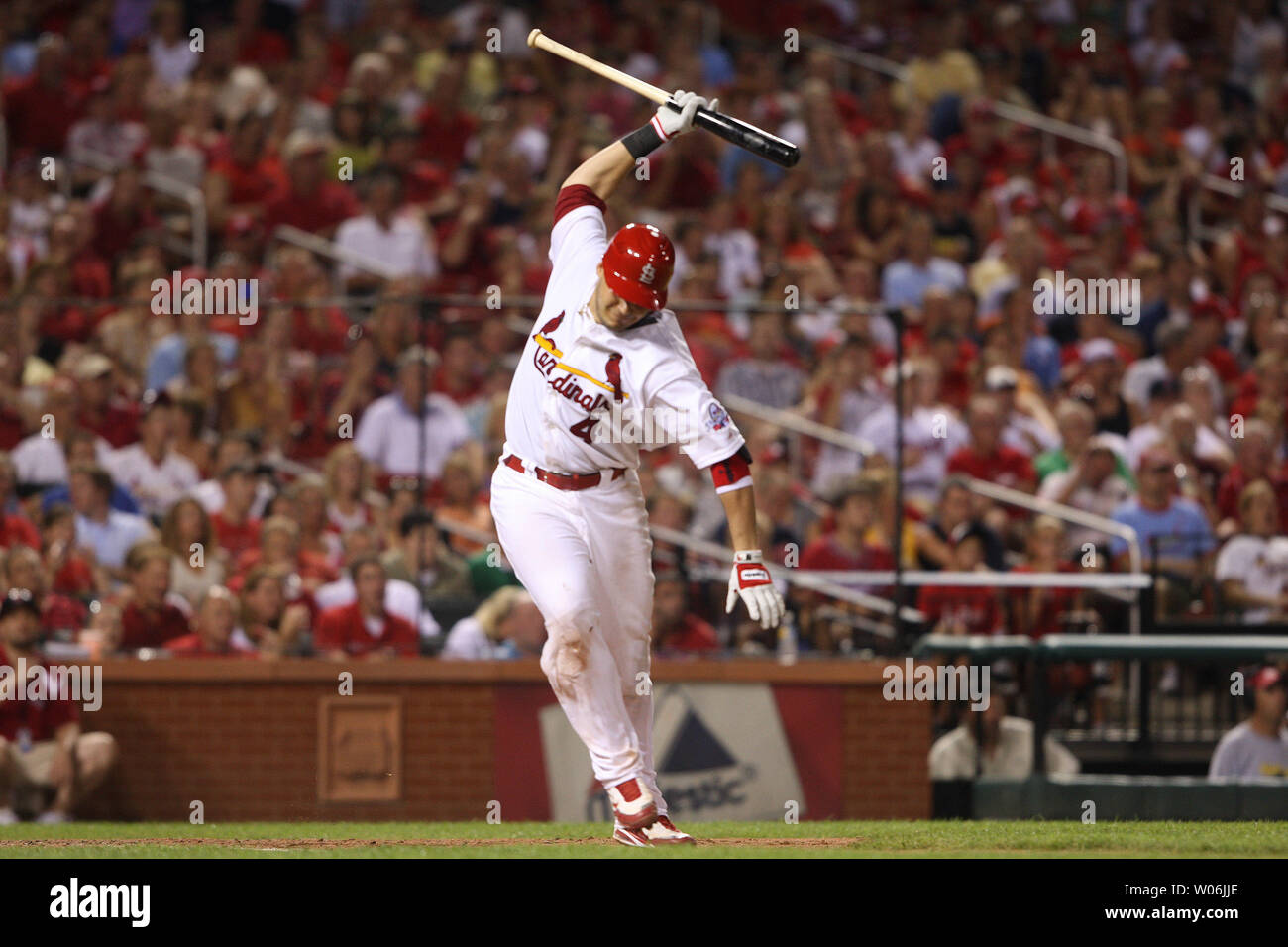 St. Louis Cardinals Yadier Molina throws his bat down in disgust after ...