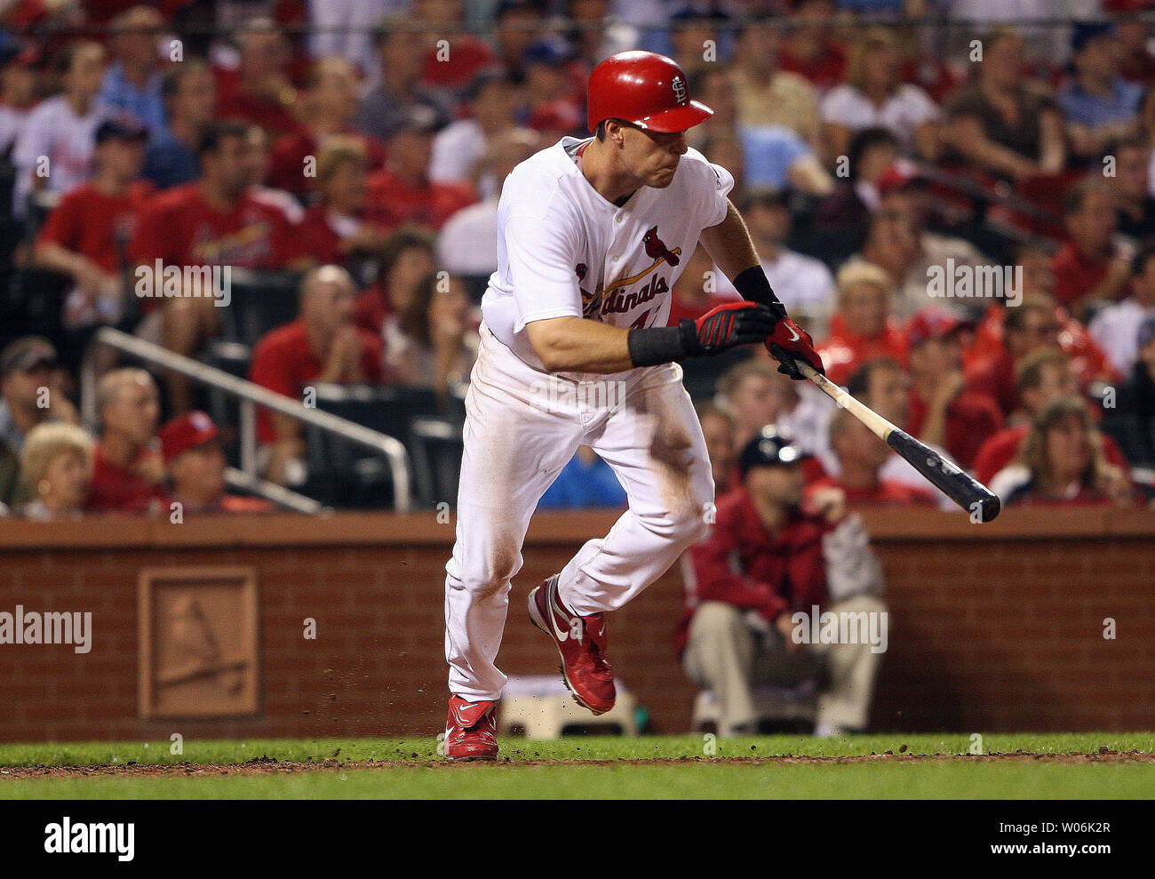 St. Louis Cardinals Ryan Ludwick runs toward first base after ...