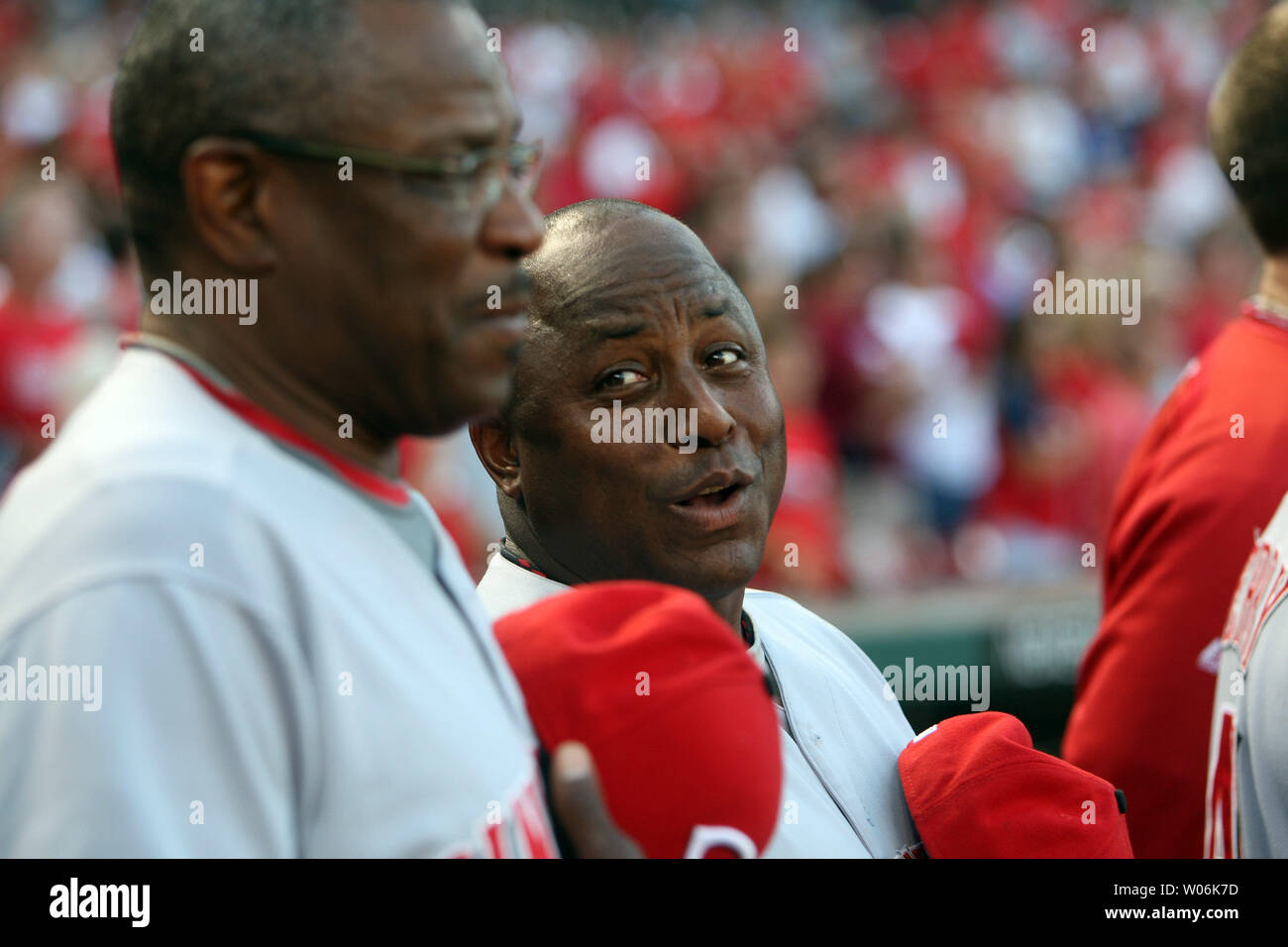 Cincinnati Reds first base coach Billy Hatcher (R) jokes with manager ...