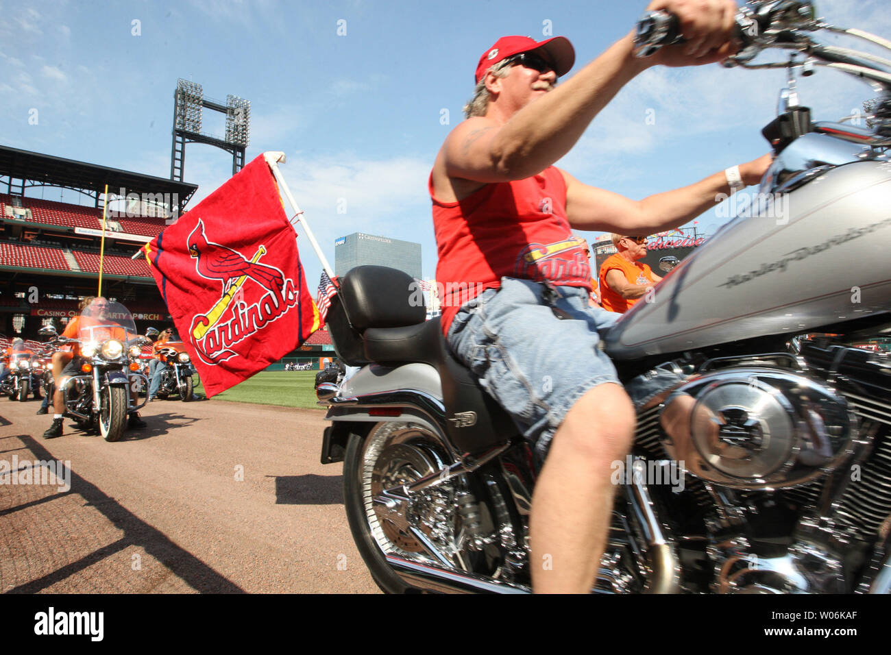 A Harley-Davidson motorcycle owner rides his bike around the Busch ...