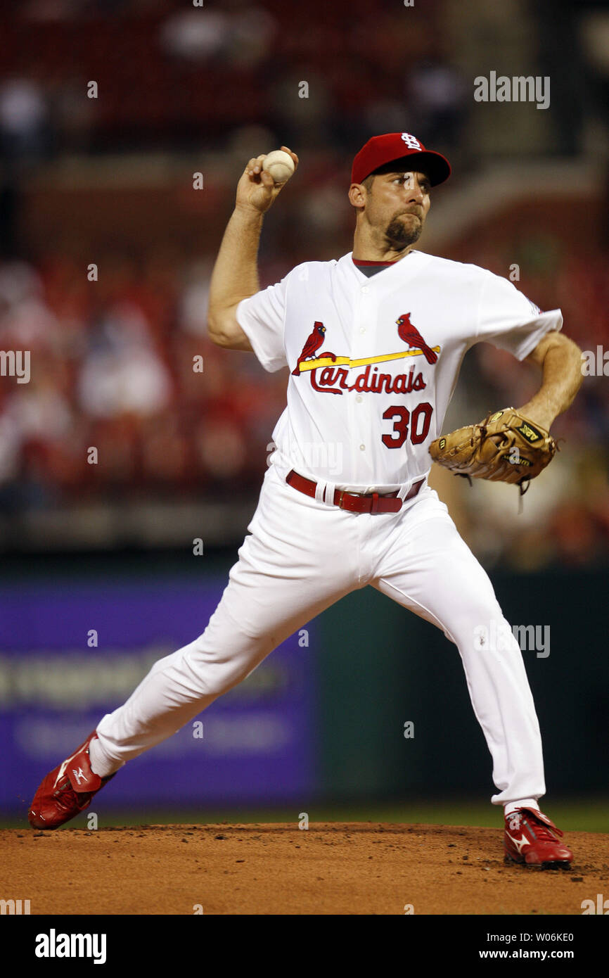 New St. Louis Cardinals starting pitcher John Smoltz delivers a pitch ...