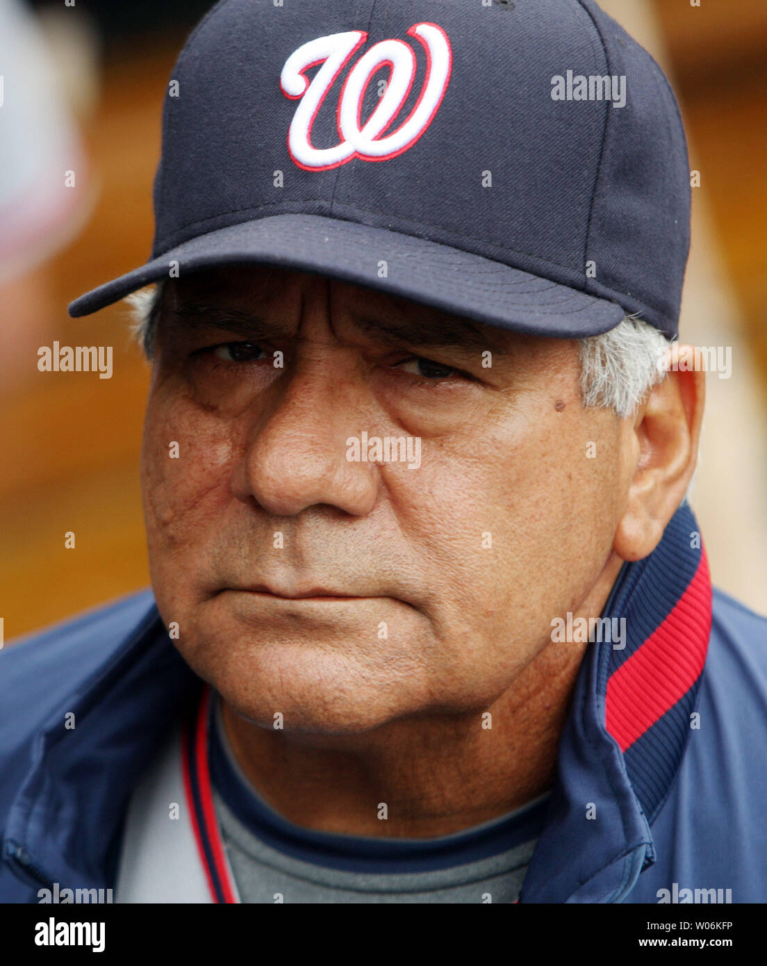 Washington Nationals coach Pat Corrales walks in the dugout before a ...