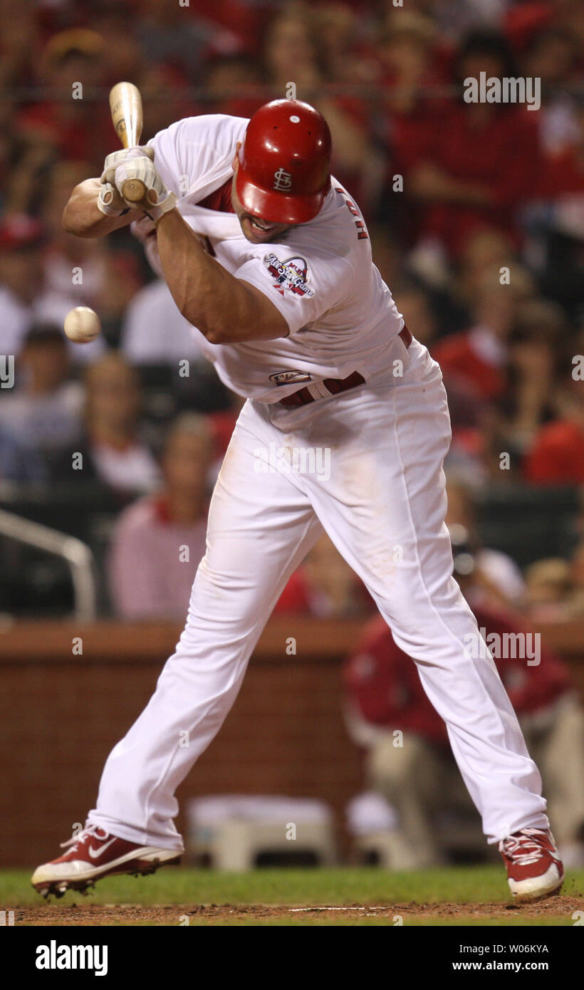 St. Louis Cardinals Matt Holliday reacts after getting hit by a pitch ...