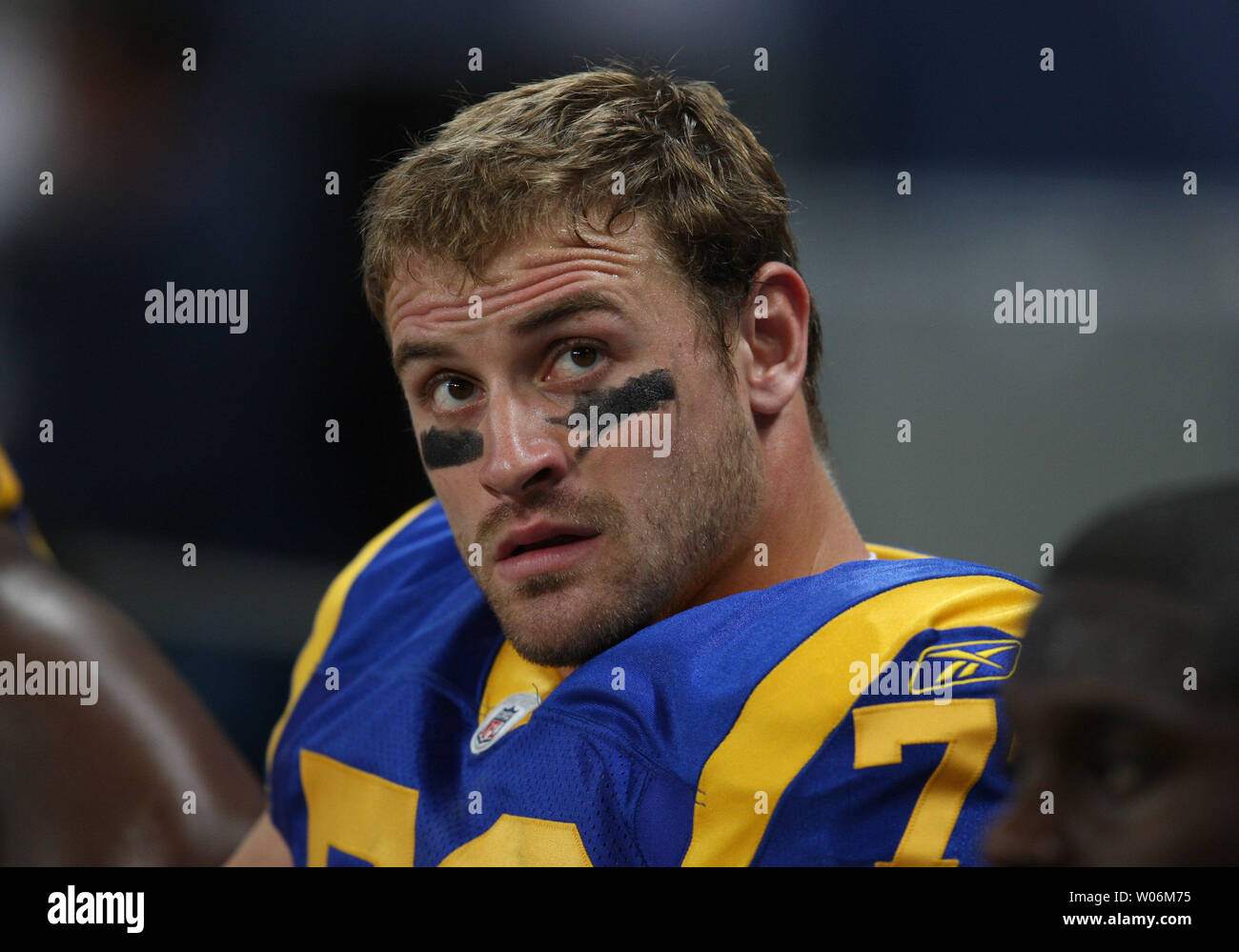 St. Louis Rams Chris Long wathes a video replay board as the Rams trail ...
