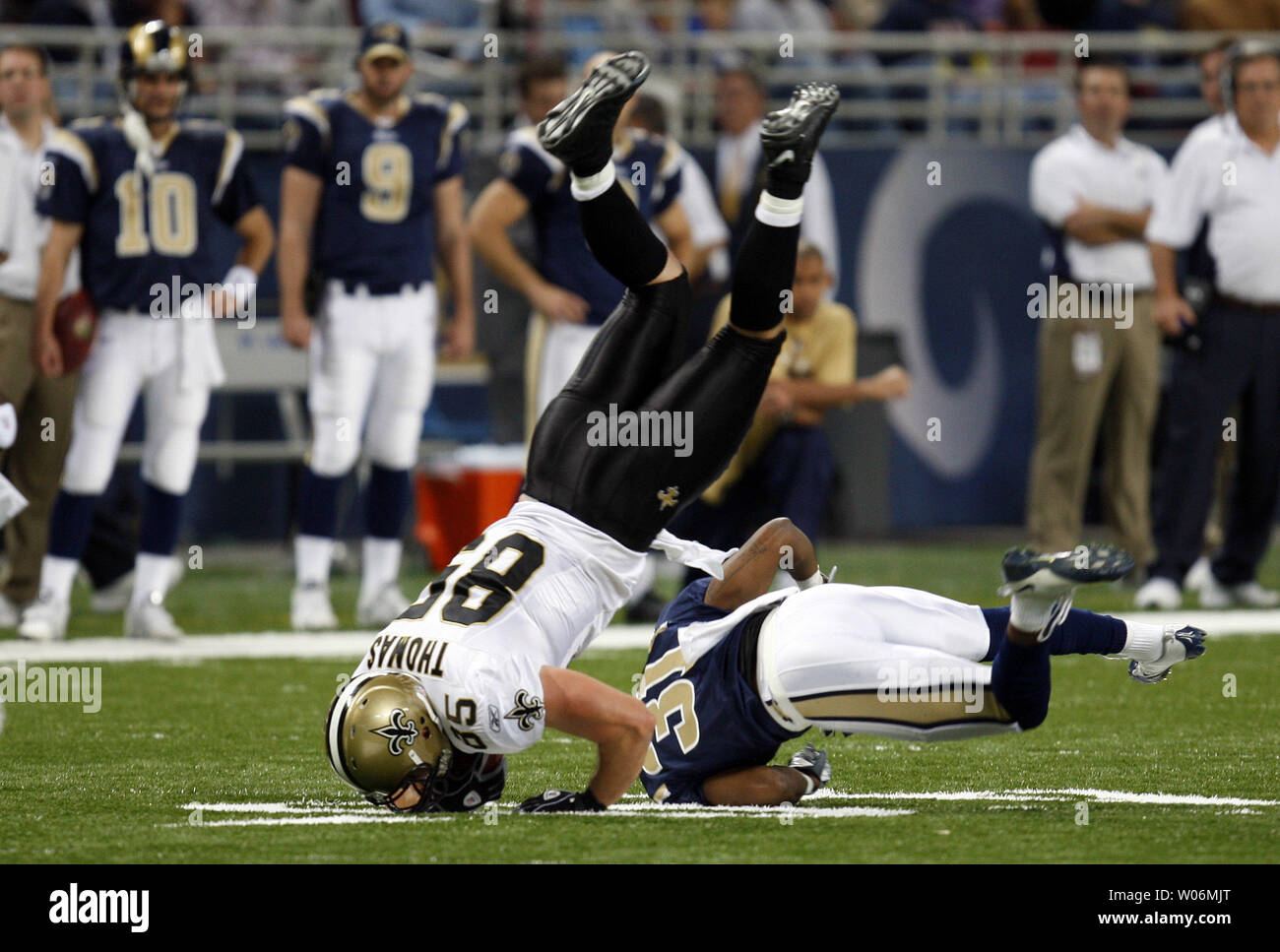 New Orleans Saints David Thomas comes down hard with the football after ...